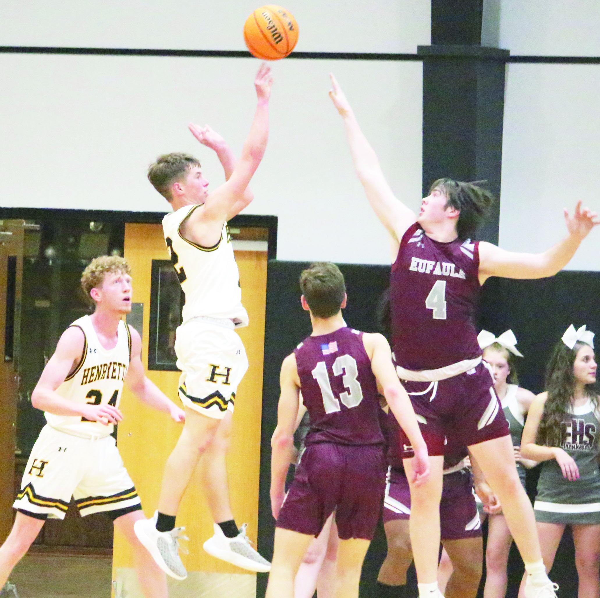 Henryetta splits season opener - gallery