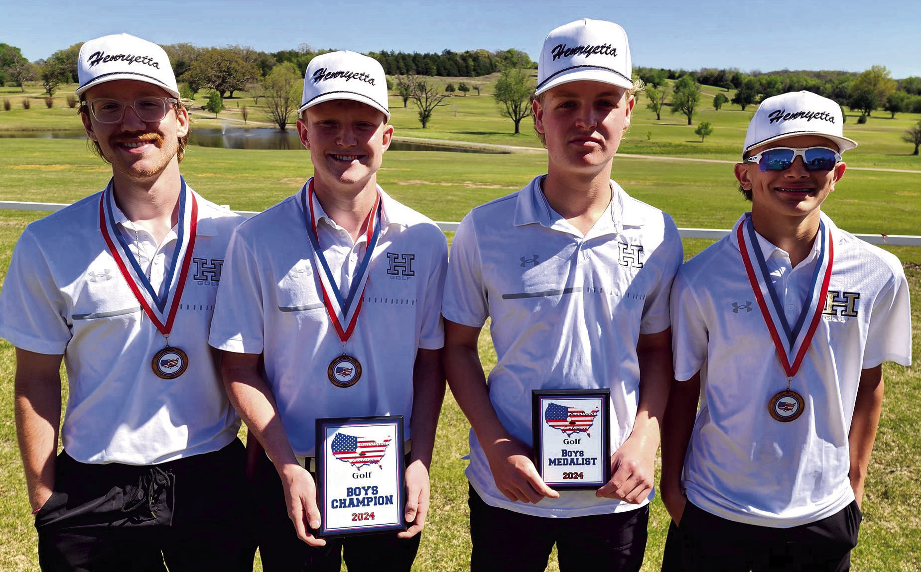Norman Earns Top Honors at Heartland Conference