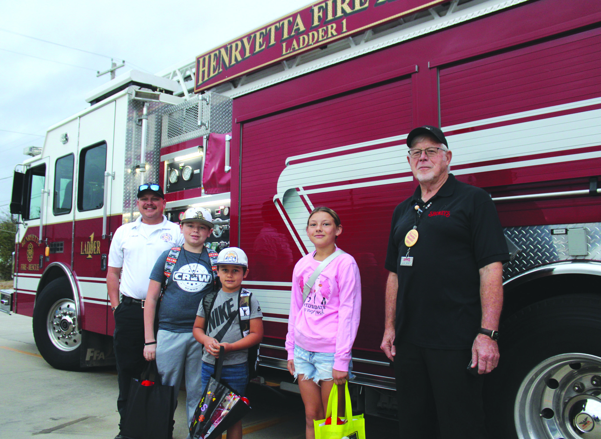Henryetta students get to ride on fire truck
